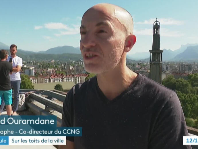 Le funambule Nathan Paulin entre Tour Perret et l' hôtel de ville de ...